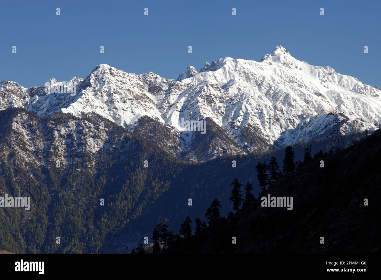 View of a snow capped Himalayan mountains in morning time near Sarahan ...