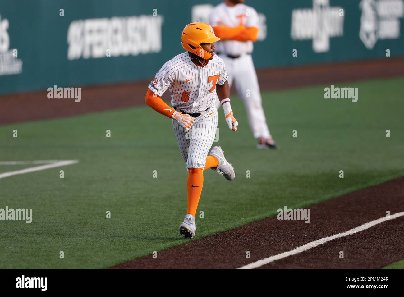 Tennessee Volunteers center fielder Kyle Booker (6) scores during an ...