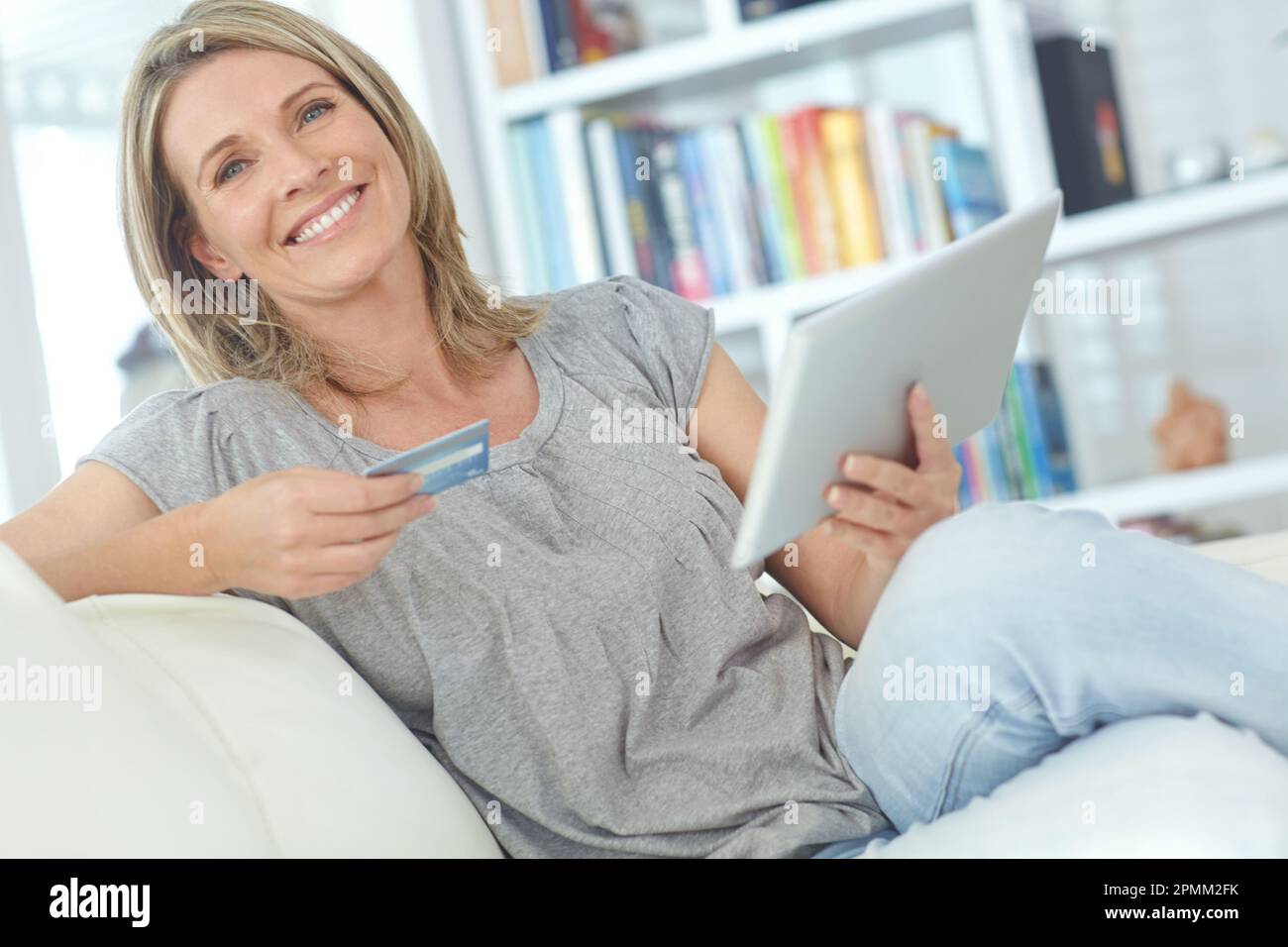 Now this is what I call comfortable shopping. Portrait of an attractive ...