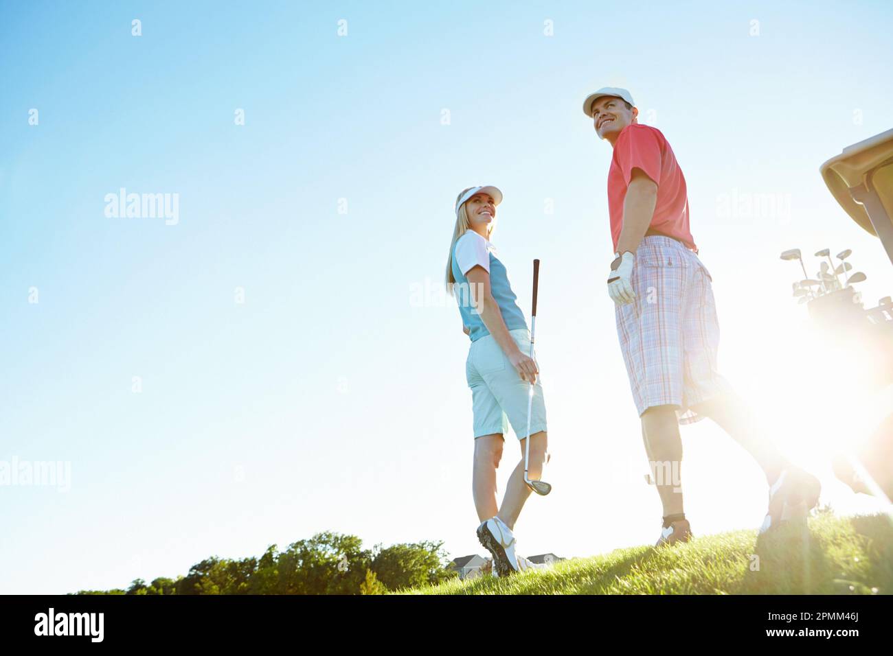 The greatest game ever played. Rear view shot of an attractive couple ...