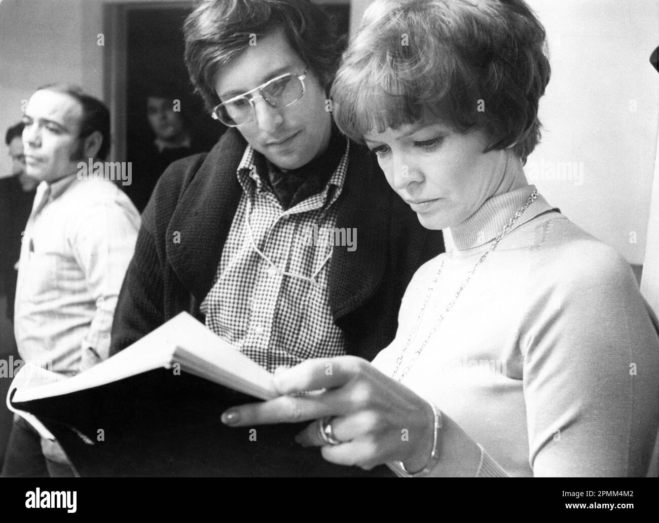 Director WILLIAM FRIEDKIN and ELLEN BURSTYN on set candid checking ...