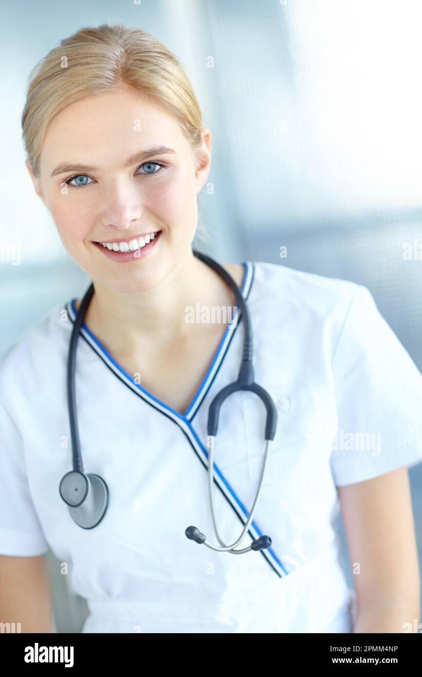 A caring professional. Portrait of a pretty nurse who is smiling Stock ...