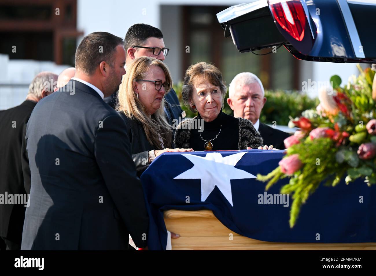 Wife June Verrier and daughter Heidi Williams react during the state ...