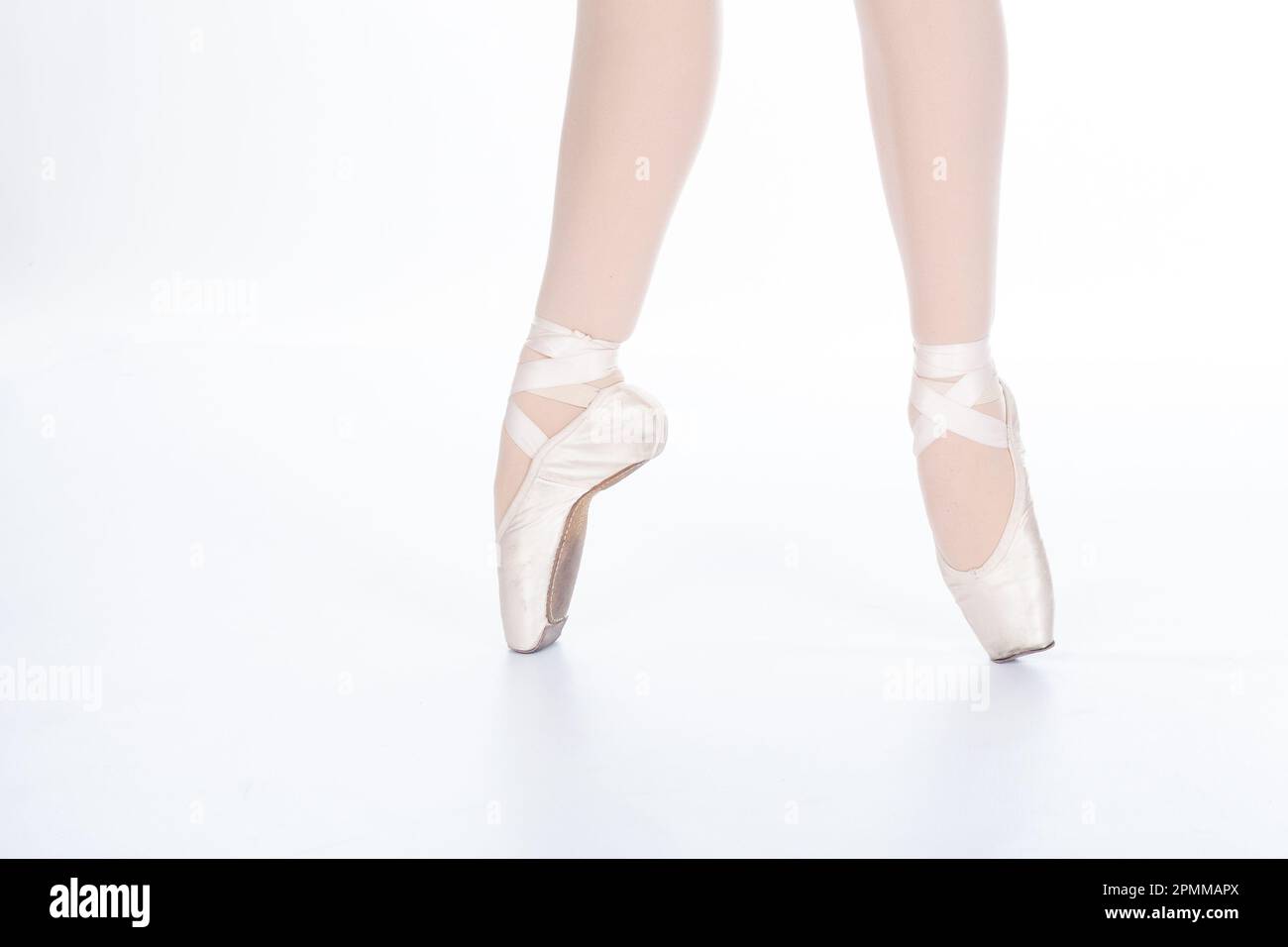 En Pointe CORRECT mid stride Close up of young female ballet dancer ...