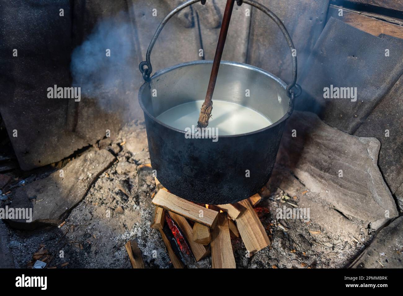 Making organic sheep cheese in wooden mountain Carpathian cheese ...