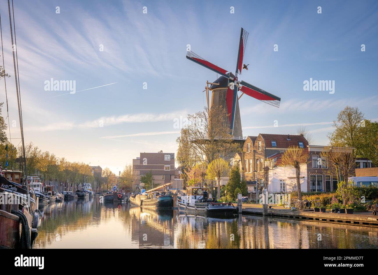 The urban landscape, the old town of Gouda, the beautiful windmill and ...