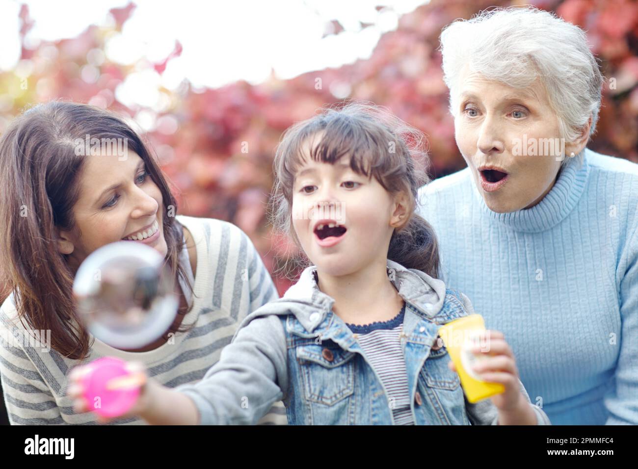 Its a bubble competition. a three generational family spending time ...