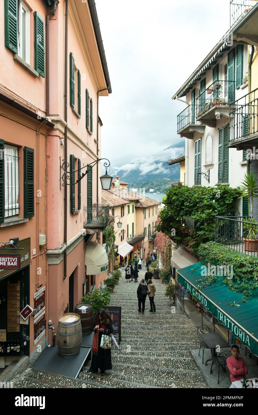 A narrow street in the town center of Bellagio overlooking Lake Como ...