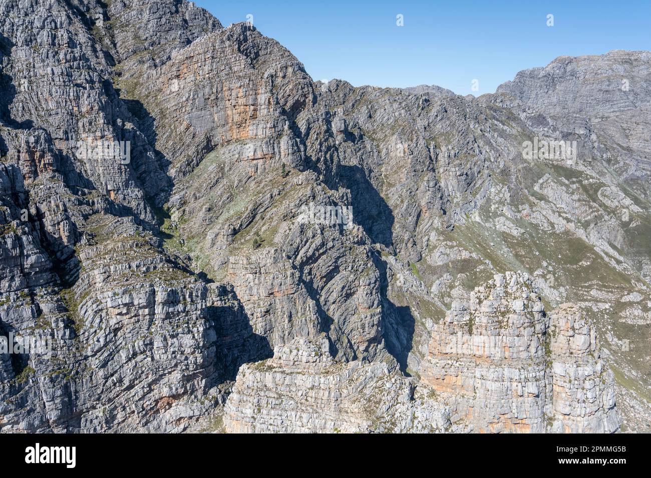 aerial landscape, from a glider, with colorful rock layers at ...