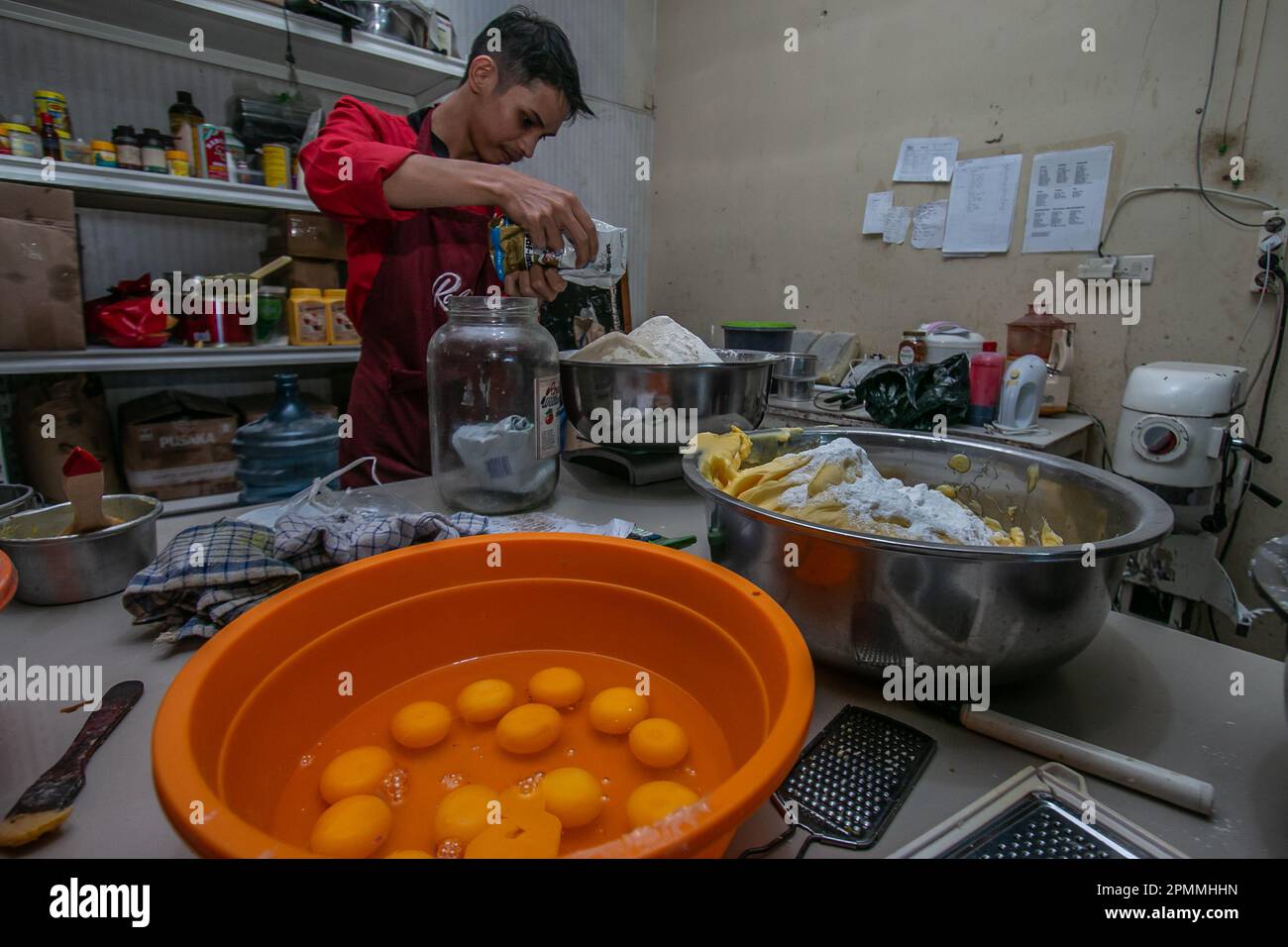 Workers produce pastries at the Rafita's Cake outlet, Bogor City ...