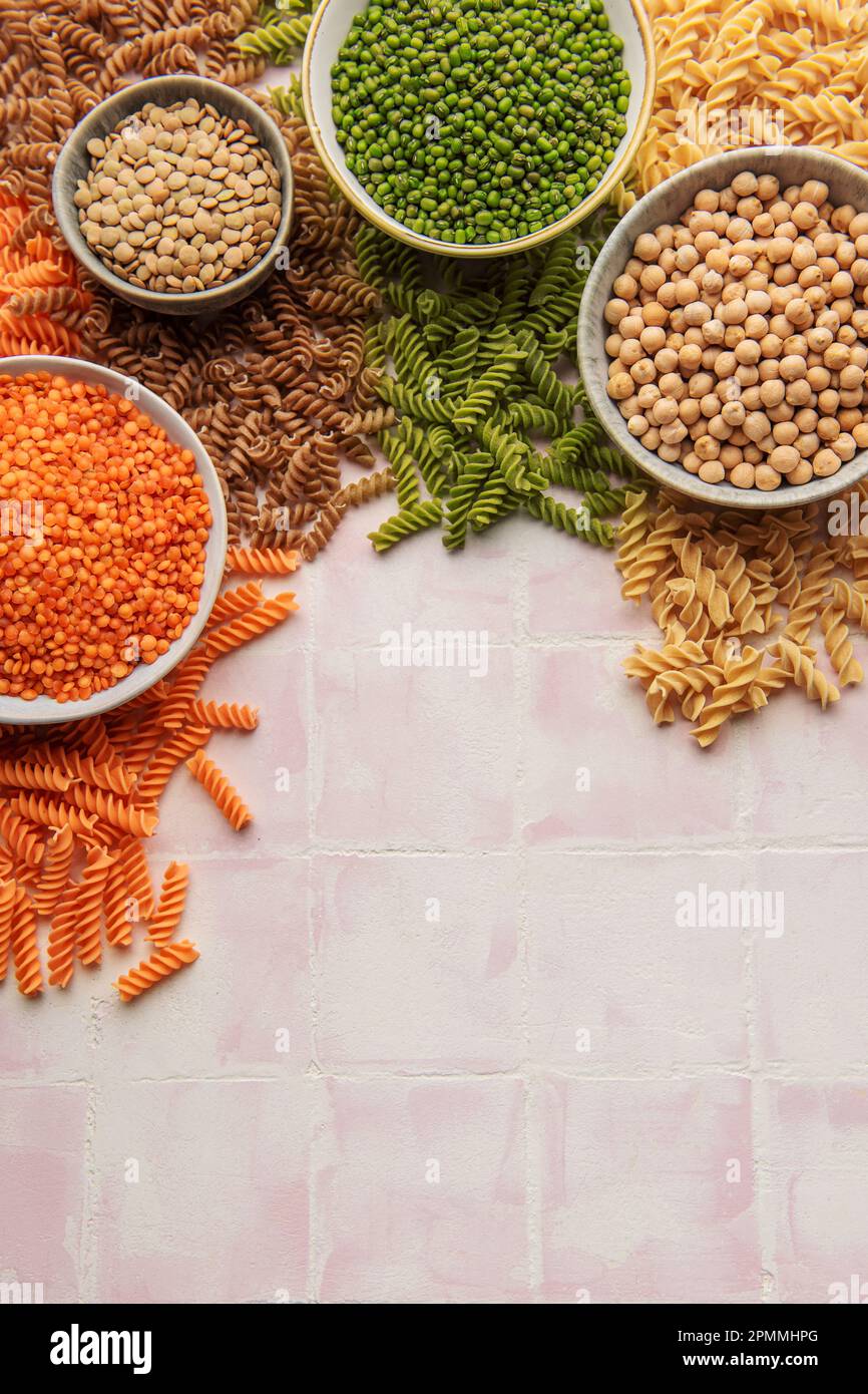 A variety of fusilli pasta made from different types of legumes, green ...