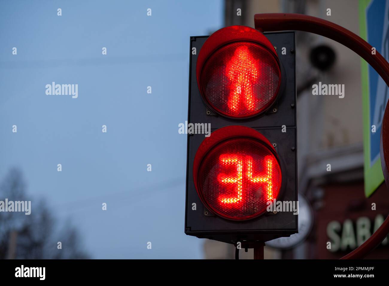 Red light on a pedestrian traffic light. Safe crossing of the road by ...