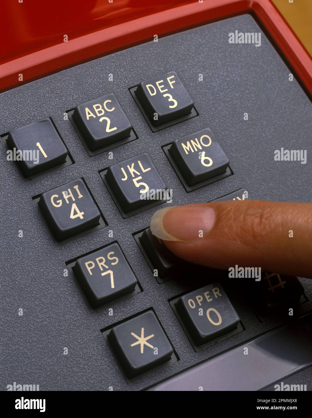1992 HISTORICAL WOMAN’S FINGER PUSHING BUTTON KEYPAD ON RED AT&T ...