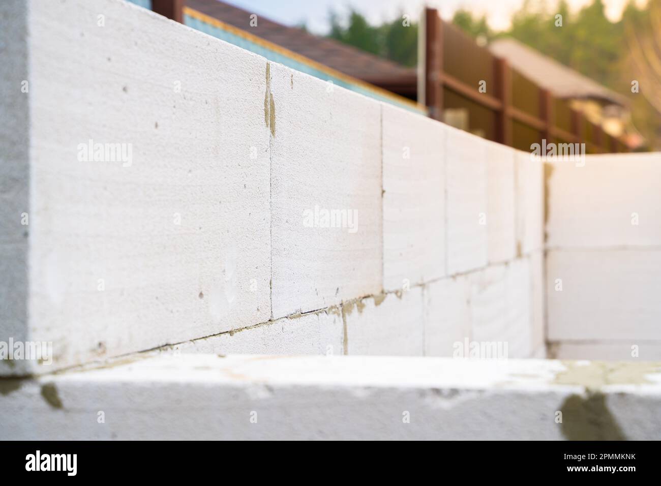 Close-up of a freshly built aerated concrete block wall. High-quality ...