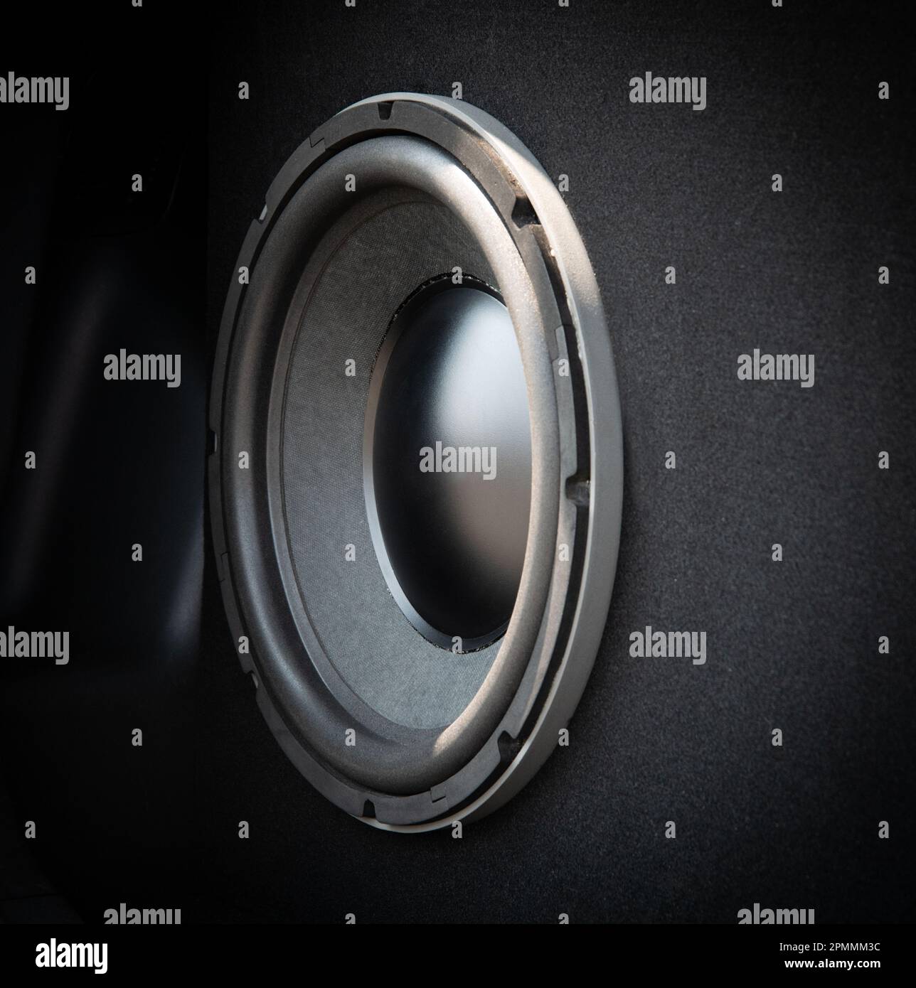 Car audio acoustic round woofer speaker in the trunk Stock Photo - Alamy
