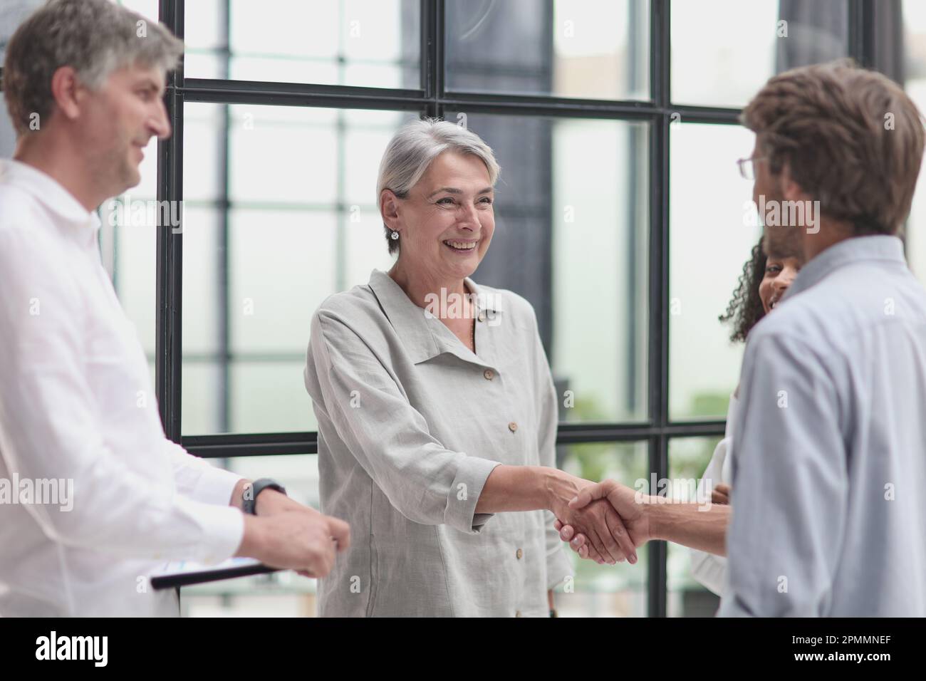 Conversation between managers and employees in the office Stock Photo ...