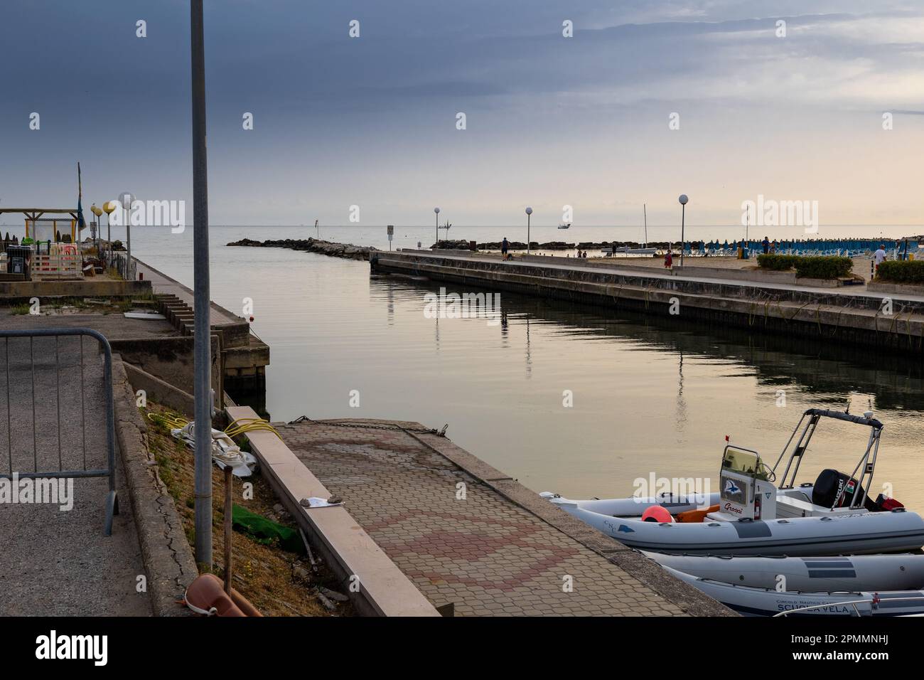 Rustic beach with rocks and sand Stock Photo - Alamy