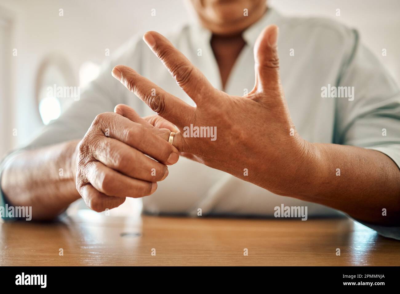 Divorce, ring and hand of old woman at home for separation, breakup and ...