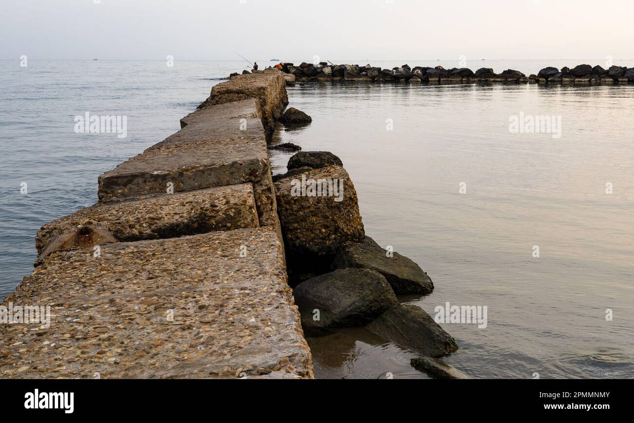 Rustic beach with rocks and sand Stock Photo - Alamy