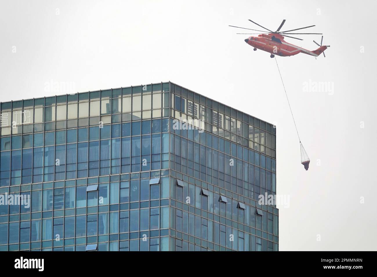 YANTAI, CHINA - APRIL 13, 2023 - A Mi-26 helicopter loaded with fire ...