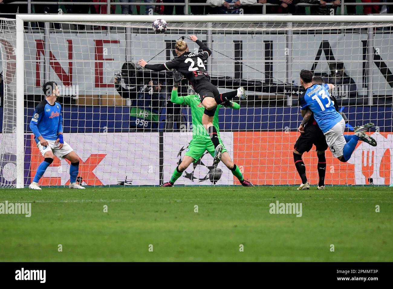 Simon Kjær of AC Milan headres the bar during the Champions League ...