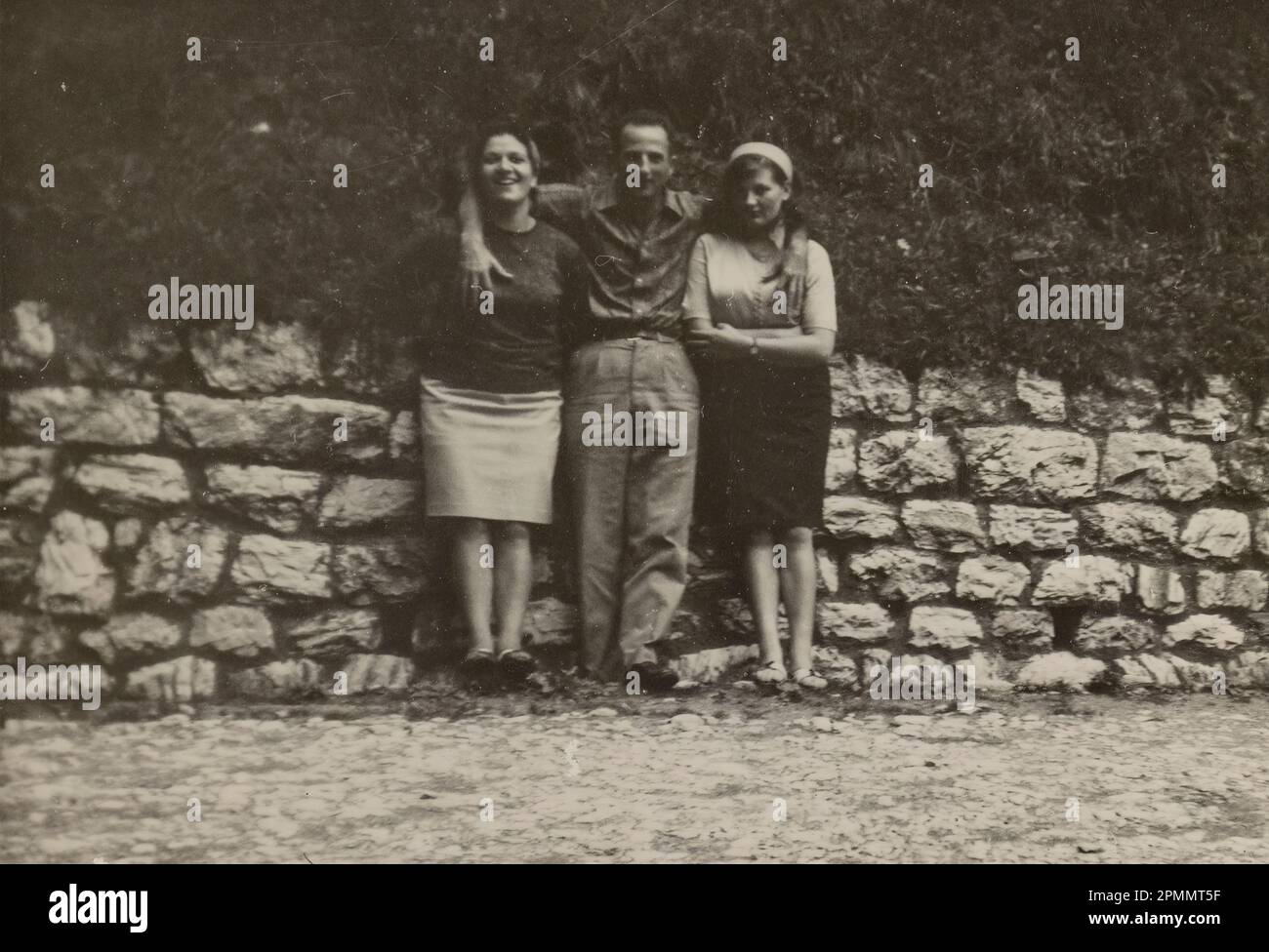 Rome, Italy may 1951: A charming portrait of a young man surrounded by ...
