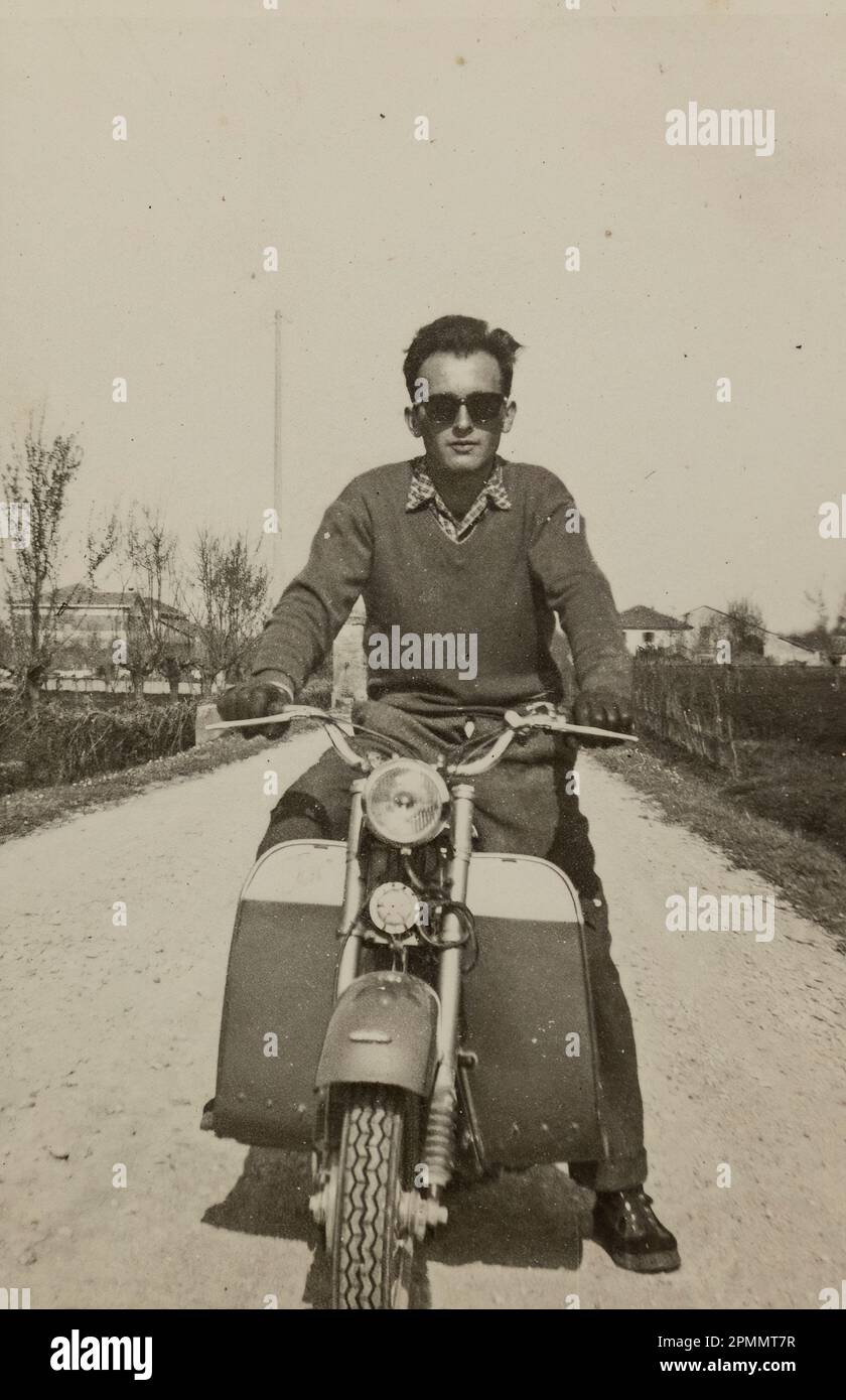 Rome, Italy may 1951: An iconic image of a young man cruising on his ...