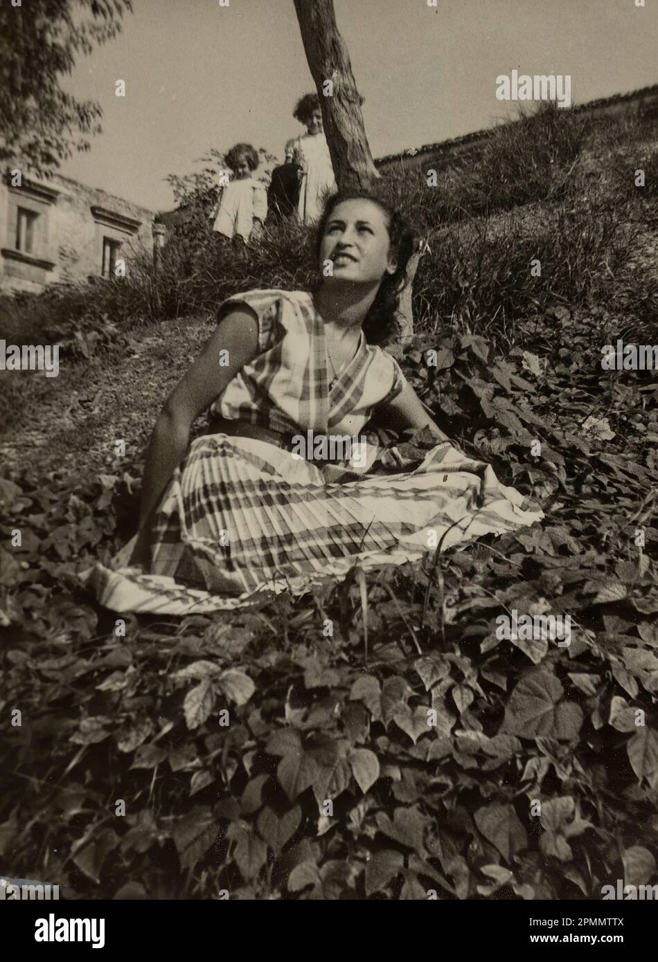 Rome, Italy may 1951: Stunning young woman enjoying nature on a ...