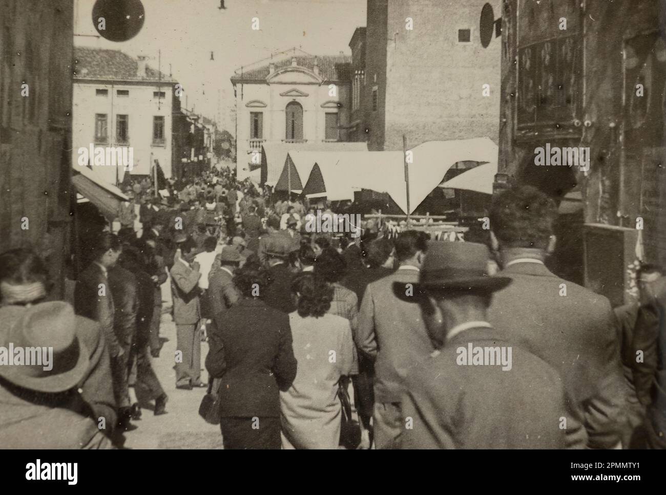 Rome, Italy may 1941: A bustling alley in an Italian city, filled with ...