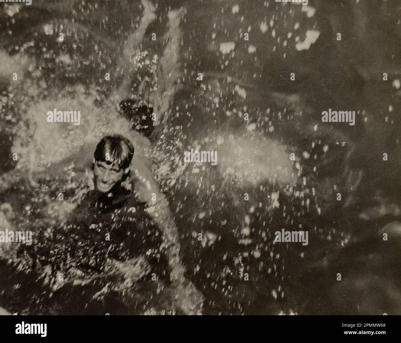 Rome, Italy may 1951: Vintage photo of a man enjoying a swim in the ...