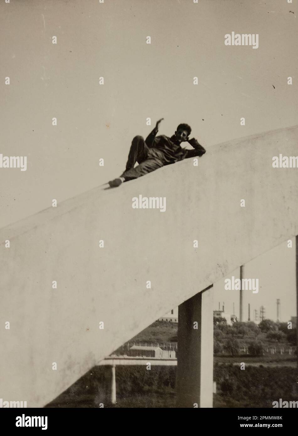 Rome, Italy may 1951: Vintage photo of a man relaxing on a monument in ...