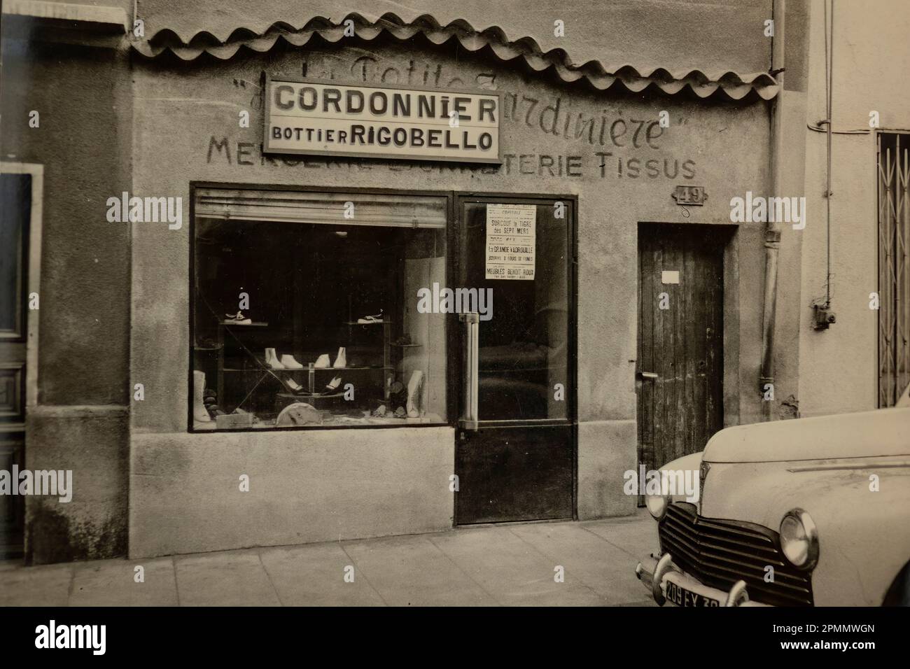 Paris, France may 1951: A display of sweet treats and baked goods in a ...