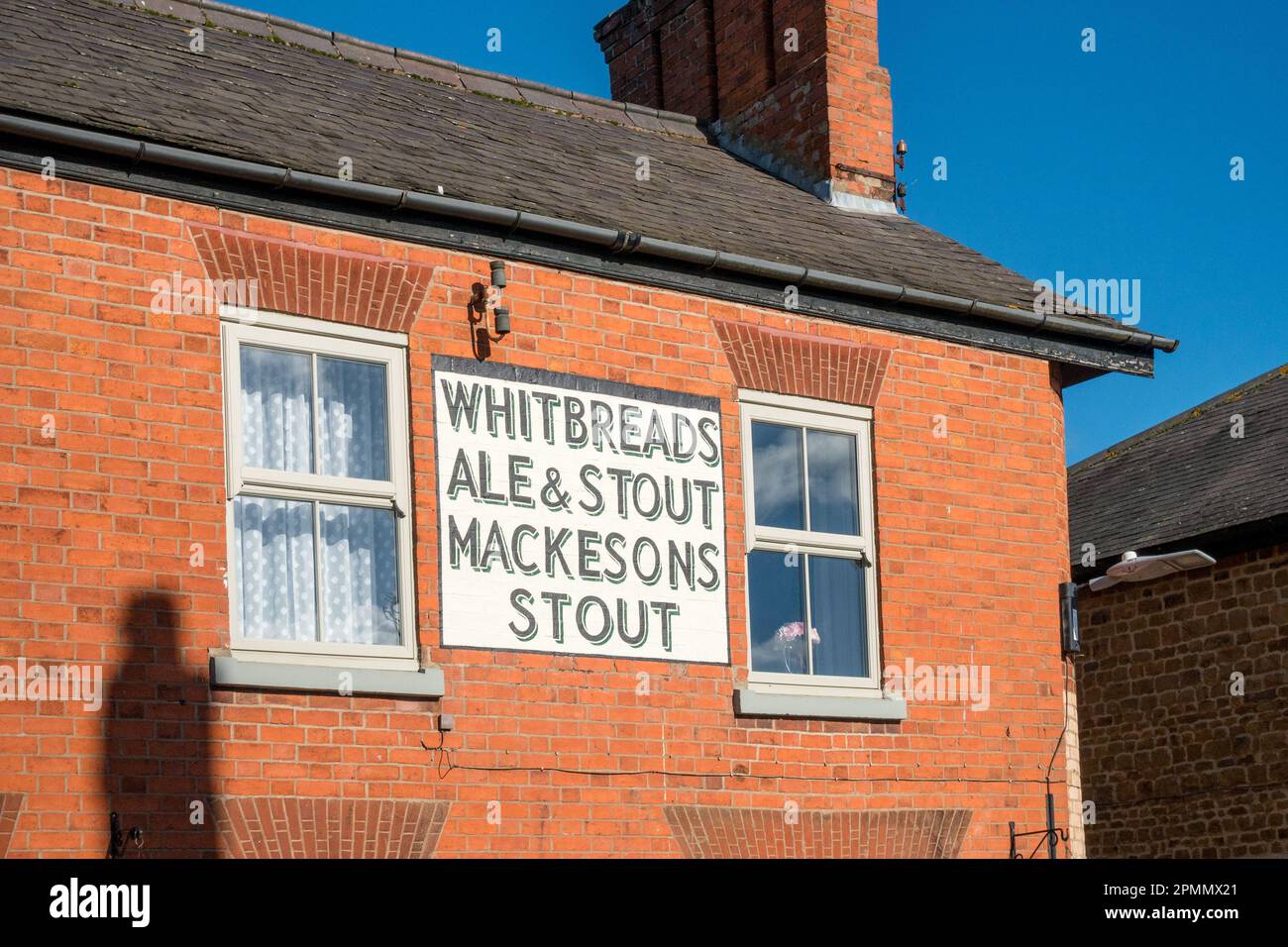 Advertising on brick wall hi-res stock photography and images - Alamy