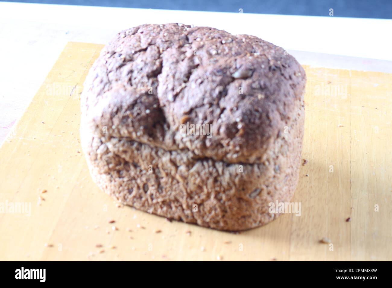 Golden brown loaf of bread baked to perfection hi-res stock photography ...