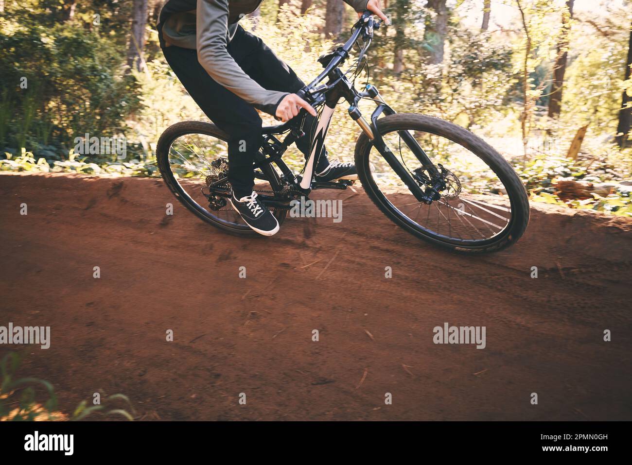 Fitness, bicycle workout and man outdoor on a forest path with extreme ...