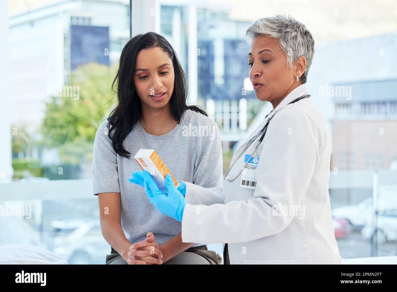 Healthcare, consultation and doctor talking to patient in a hospital ...