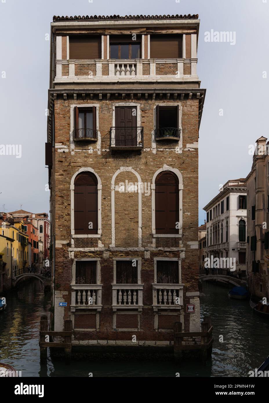 Old iconic building in Venice, Italy in middle of two canals Stock ...