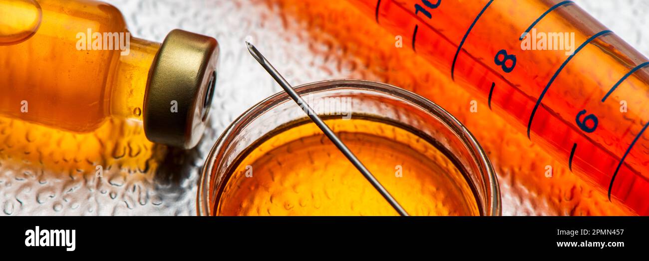 injection and vaccination with syringe and serum Stock Photo - Alamy