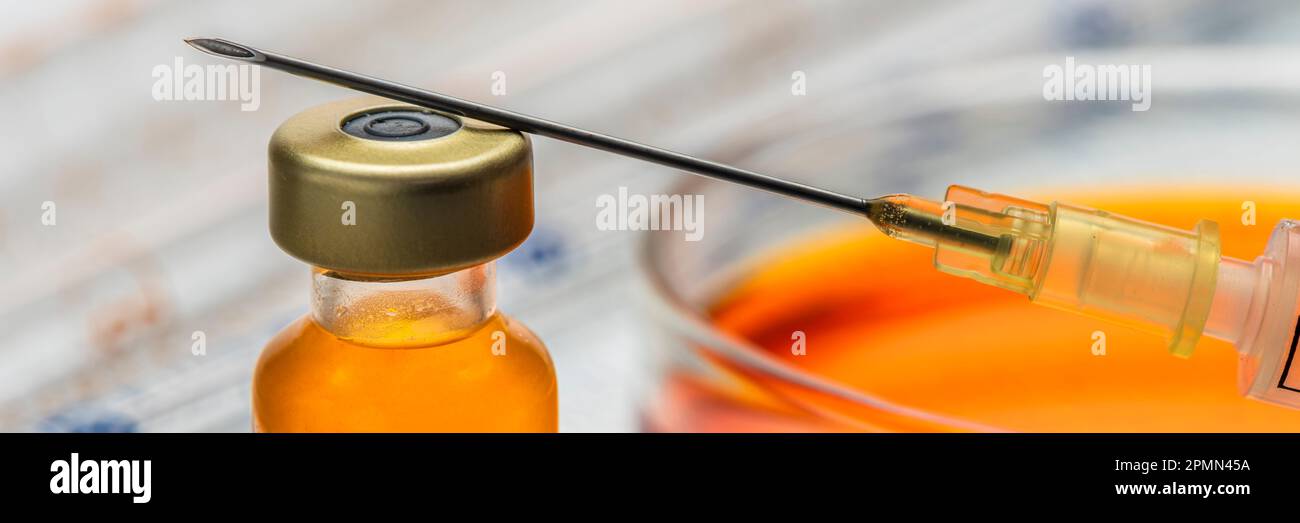 injection and vaccination with syringe and serum Stock Photo - Alamy