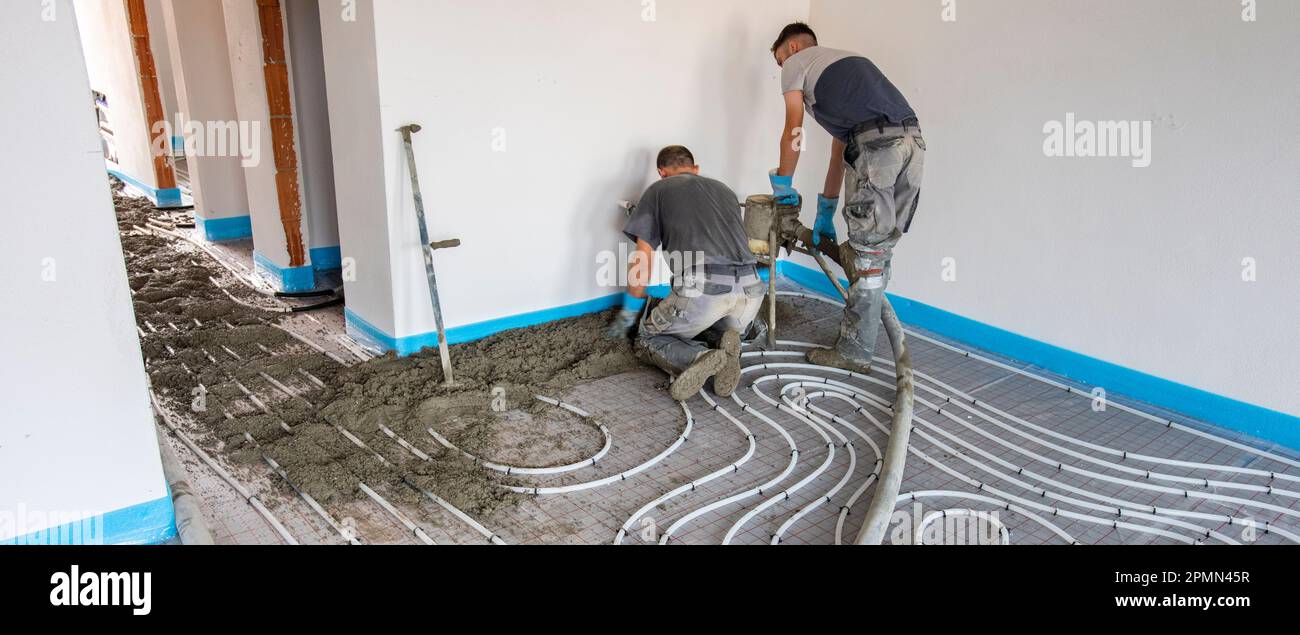 Screeding at construction of new built house Stock Photo - Alamy