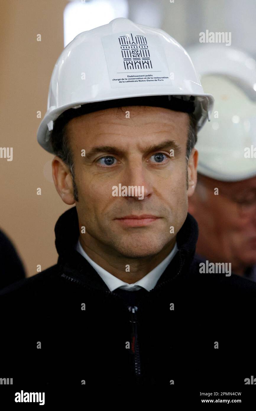 French President Emmanuel Macron visits the restoration site at the ...