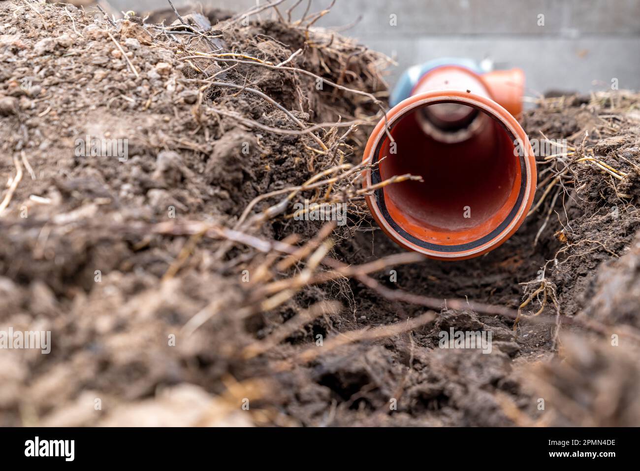 plastic pvc waste sewer pipe in the ground. construction site Stock ...