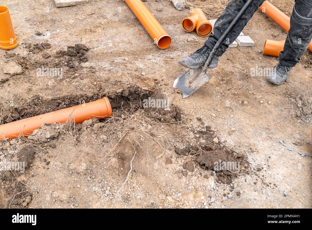 plastic pvc waste sewer pipe in the ground. construction site Stock ...