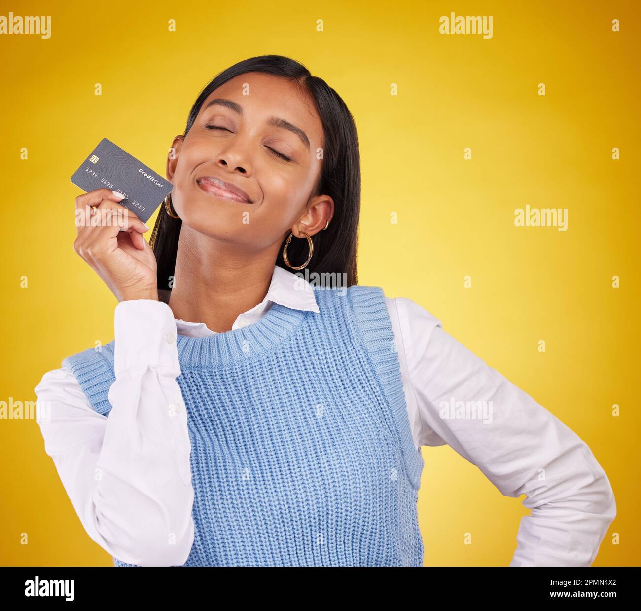 Credit card, smile and Indian woman on yellow background for bank ...