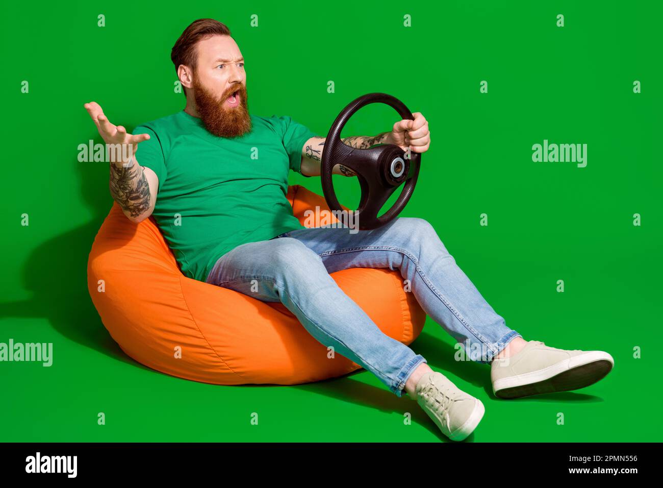 Full length photo of stressed angry man wear t-shirt sitting bean bag ...