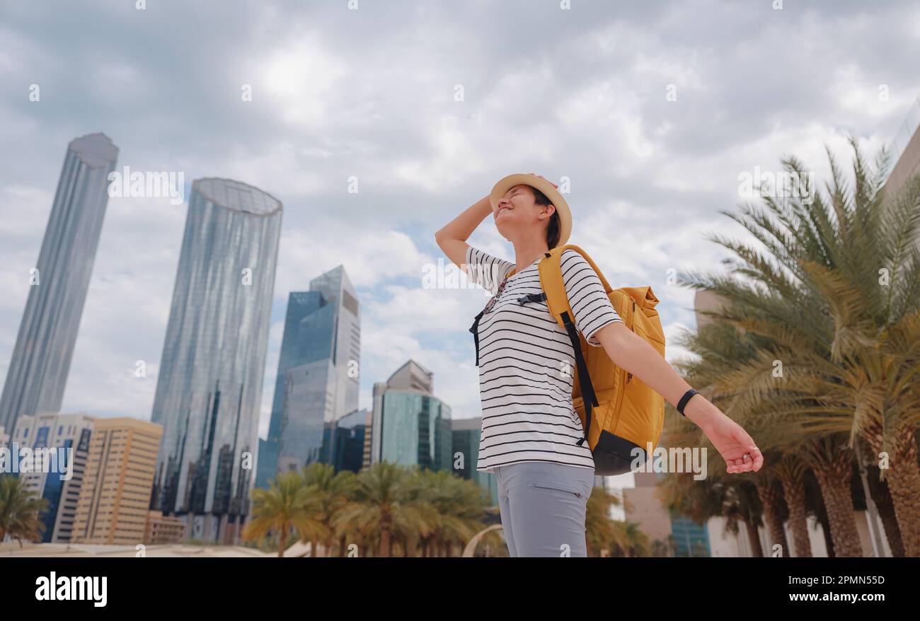 travel to the United Arab Emirates, Happy young asian female traveler ...