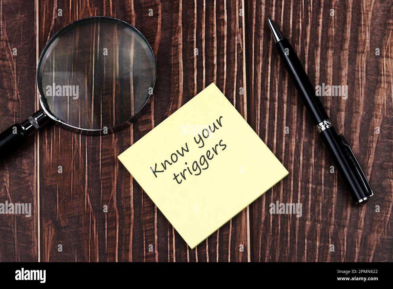 Adhesive note with text know your triggers Stock Photo - Alamy