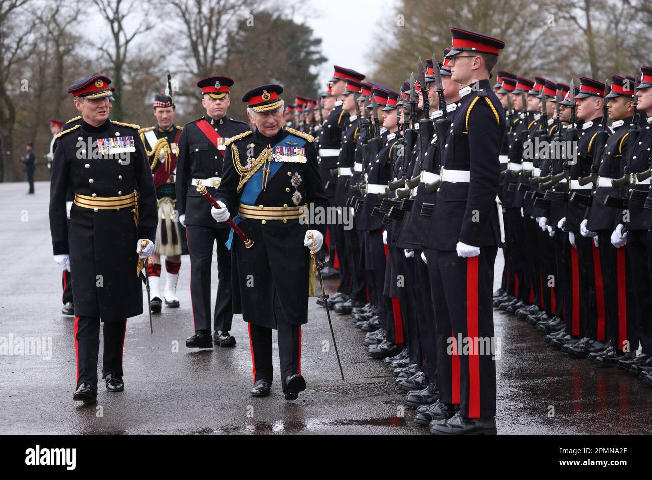 King Charles III inspects Officer Cadets on parade during the 200th ...