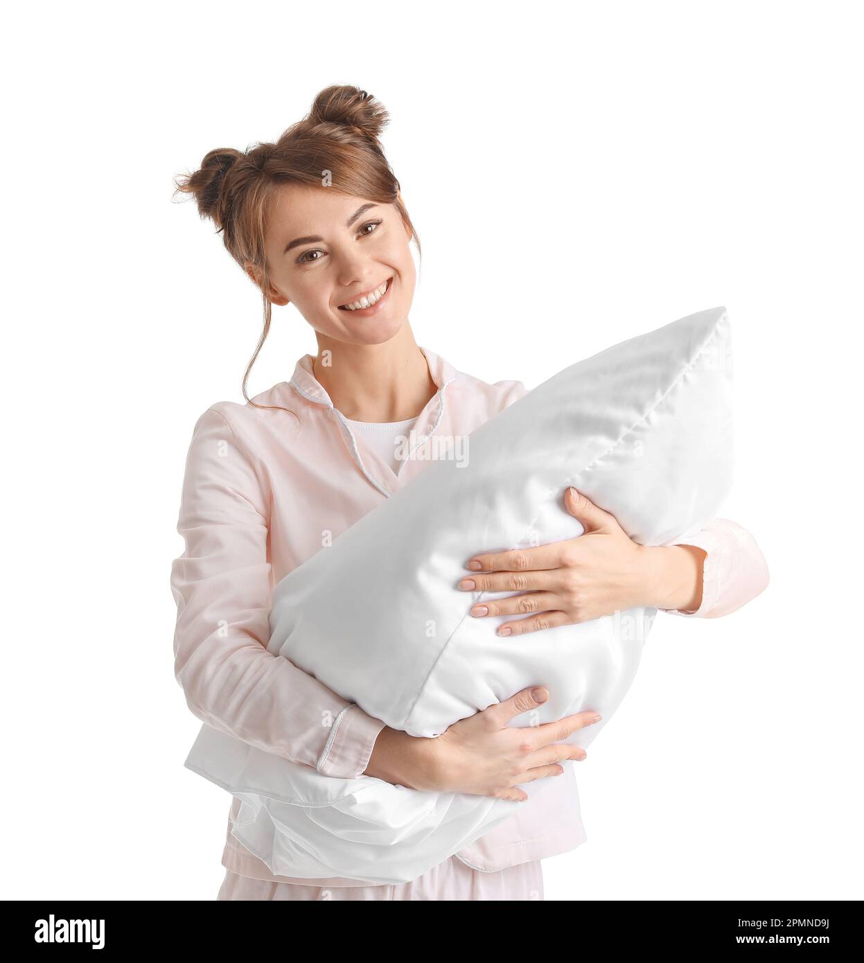 Beautiful woman in pajamas with pillow on white background Stock Photo ...