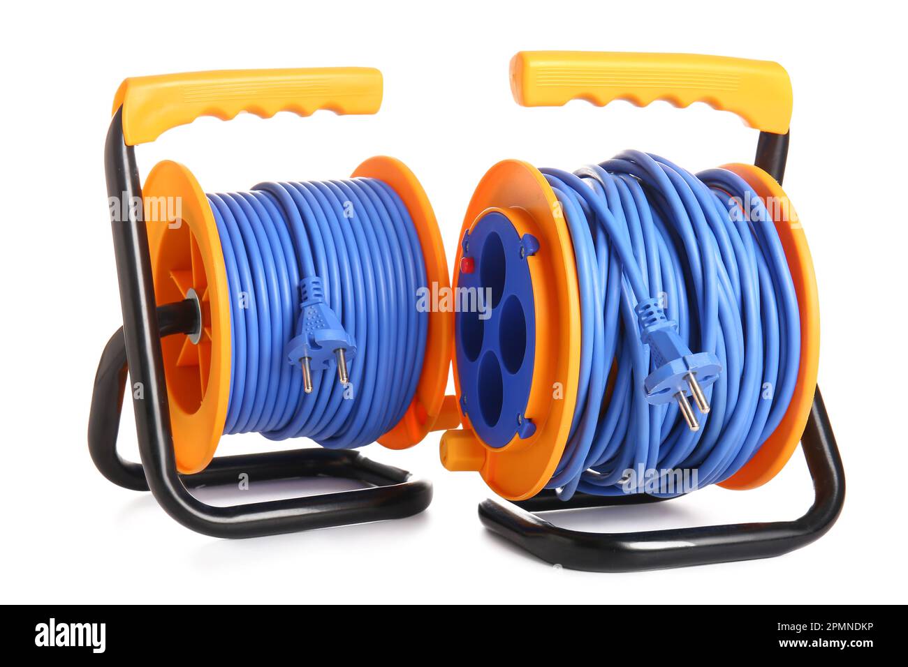 Extension electric cable reels on white background Stock Photo - Alamy